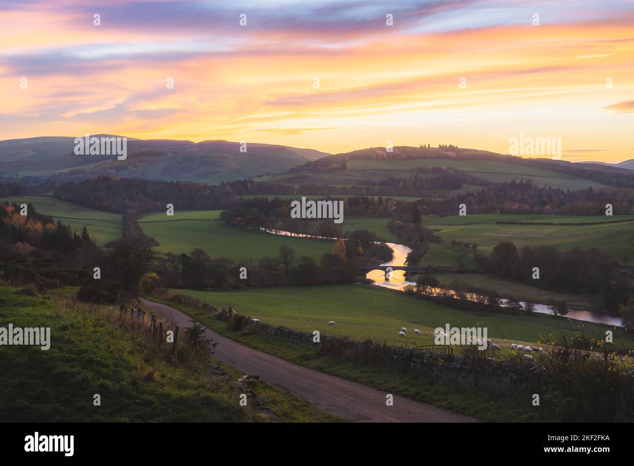 Beautiful landscape view at sunset in Autumn of rolling hills and rural ...