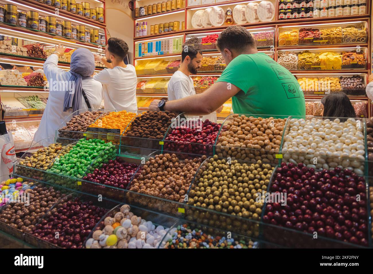 Istanbul, Turkey - October 1 2022: Shoppers and vendors at a colourful ...