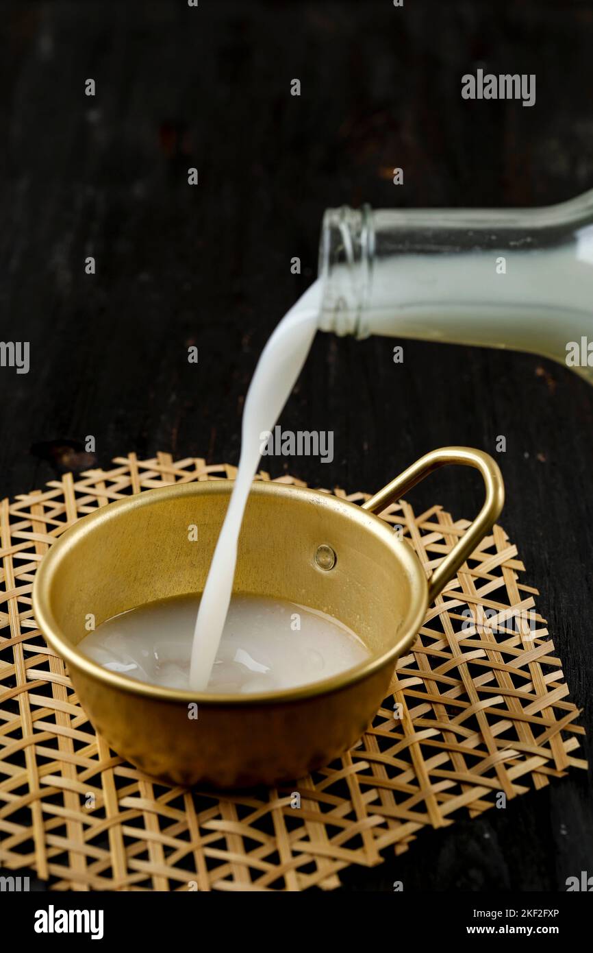 Pour Makgeolli, Korean Traditional Alcohol, Korean Rice Wine. Selected ...