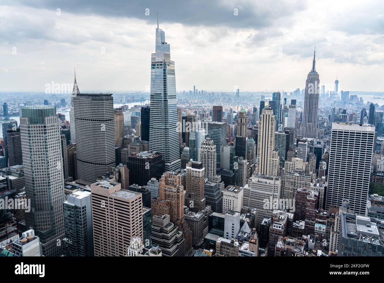 Panoramic view of the metropolis with tall skyscrapers and even rows of ...