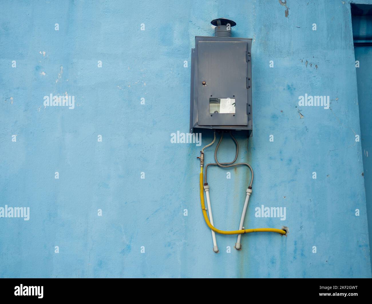 Gas column on the wall. Home water heating equipment. vintage ...