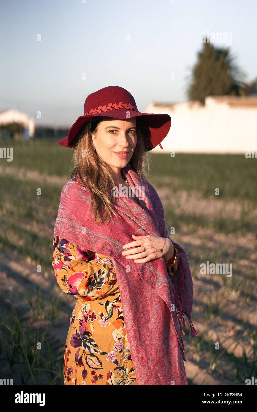 Mature woman in red dress hi-res stock photography and images - Alamy