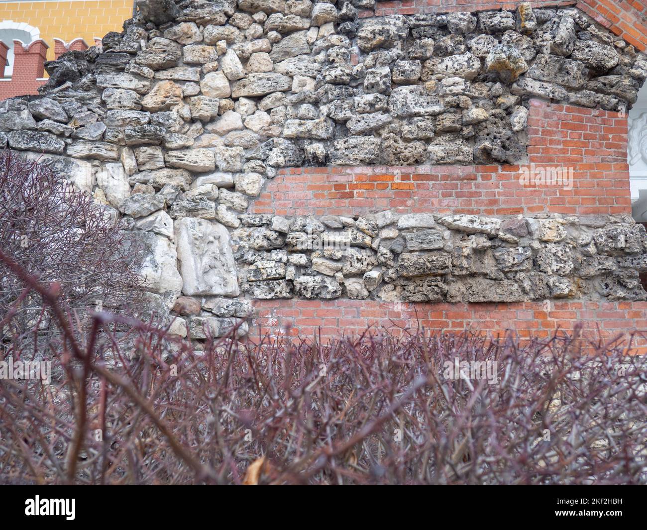 Old red brickwork. Layers of stones. Ancient work. Kremlin wall ...