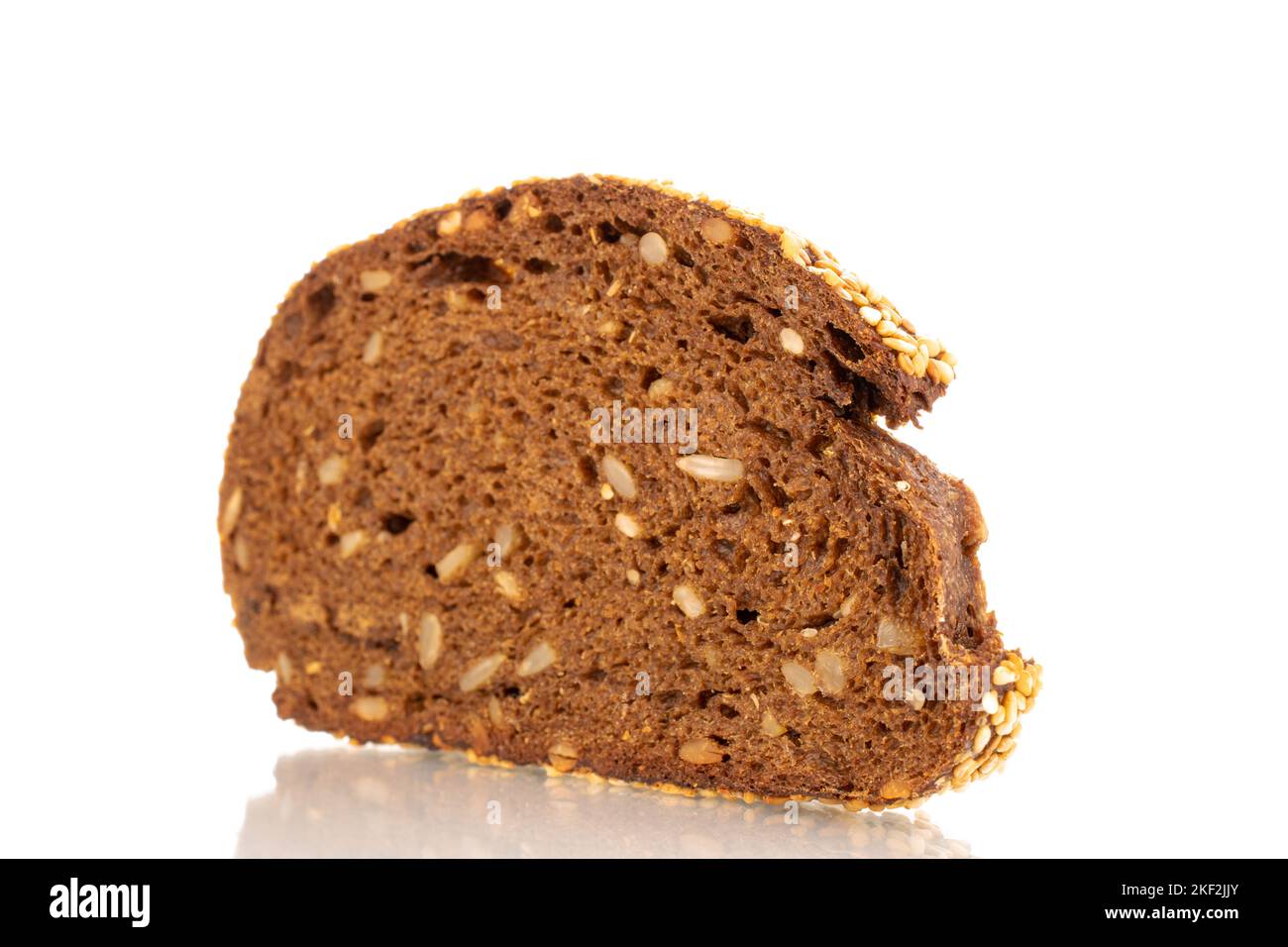 One slice of rye multigrain bread, macro, isolated on white background ...