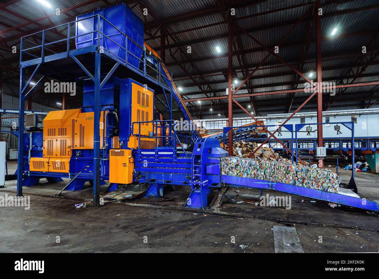 Modern waste processing plant. Sorting, pressing and packing of garbage ...