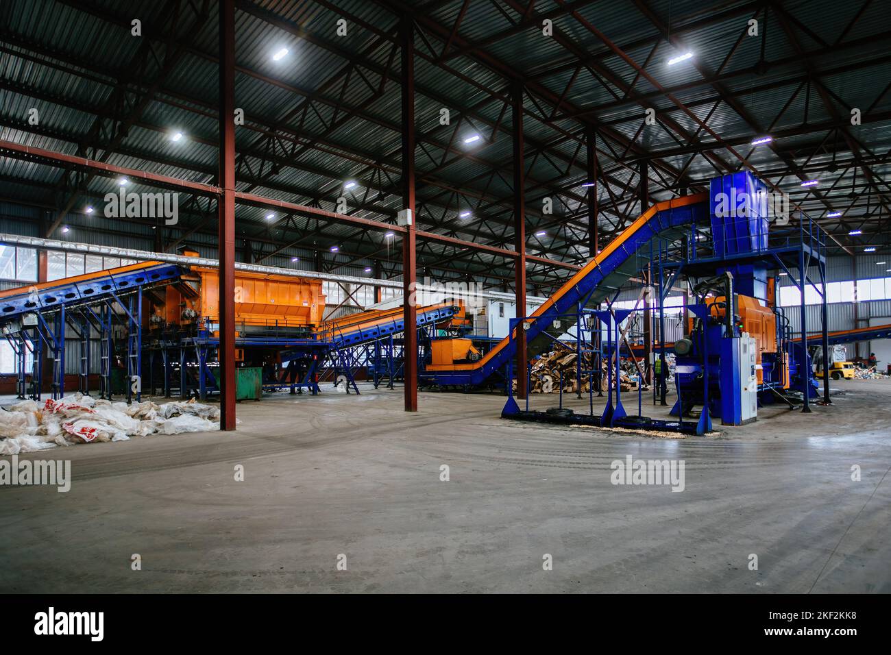 Modern waste processing plant. Sorting, pressing and packing of garbage ...