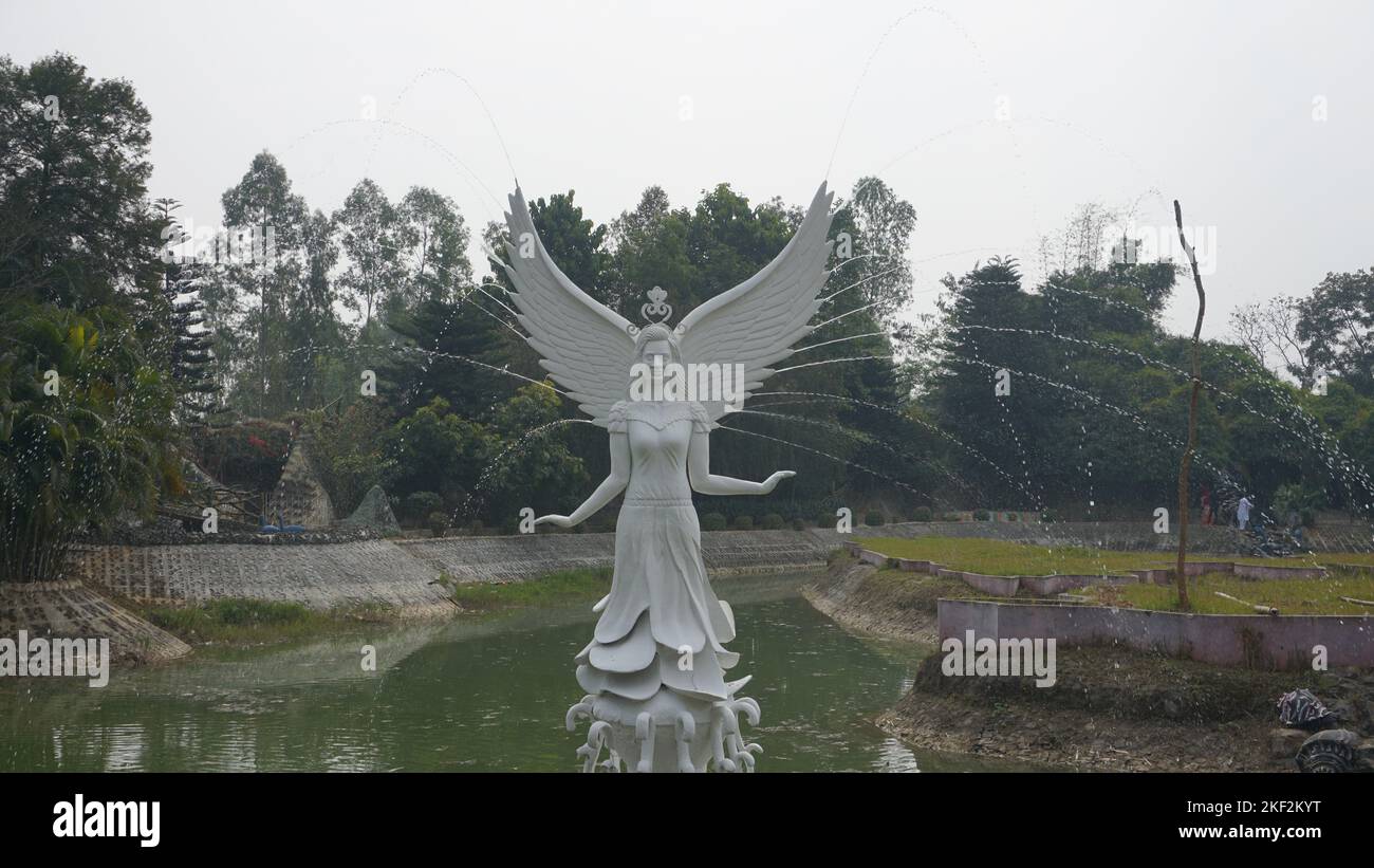 concrete angel water fountain sculpture Stock Photo - Alamy