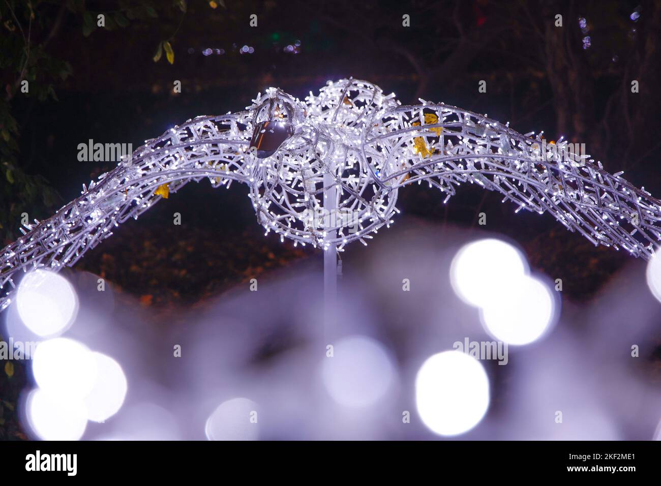 A sculpture with LED colored lights in the shape of a swan is seen in ...