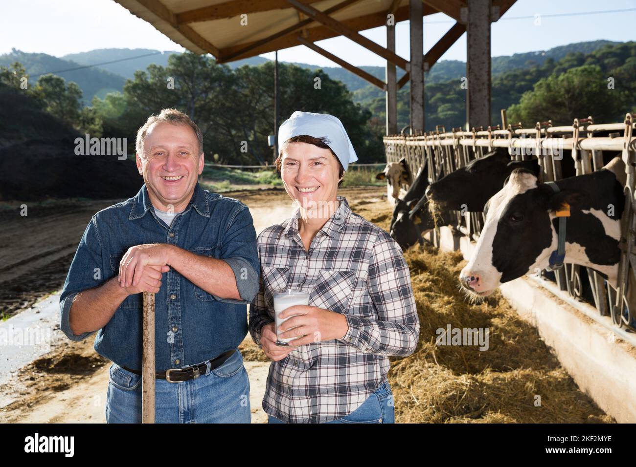 Successful owners of dairy farm Stock Photo - Alamy