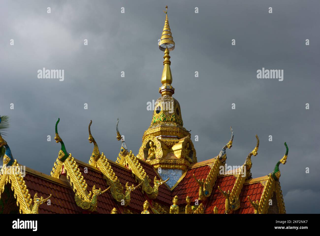 Thailand temple detail view and ancient traditional monument with gold ...