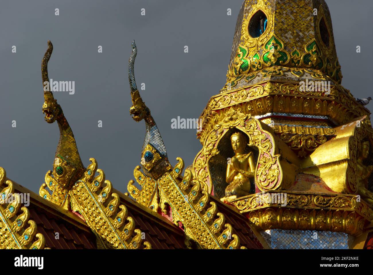 Thailand temple detail view and ancient traditional monument with gold ...