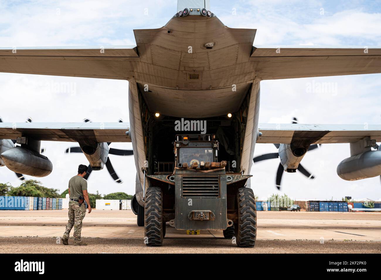 Cargo is unloaded from a U.S. Marine Corps KC-130J assigned to the ...