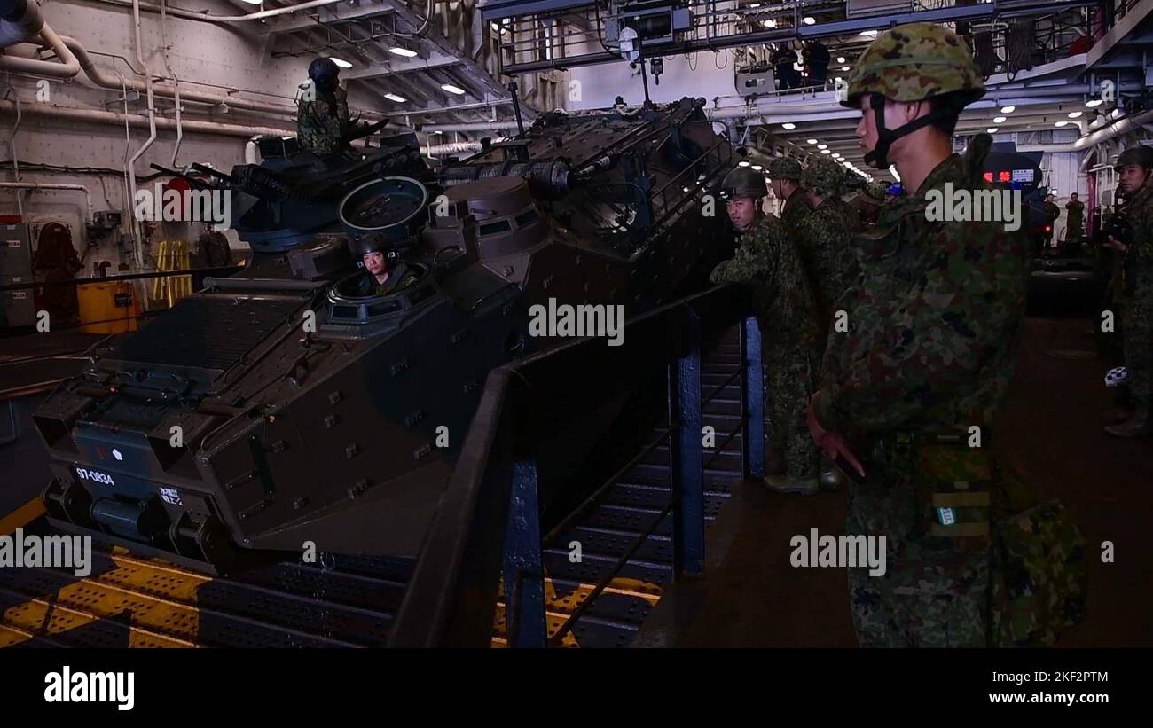 221106-N-XB010-1026 EAST CHINA SEA (Nov. 6, 2022) – Members of the ...