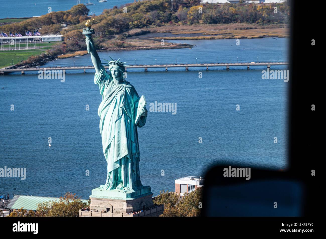 An overhead shot of the Statue of Liberty aboard a UH-60M Blackhawk ...