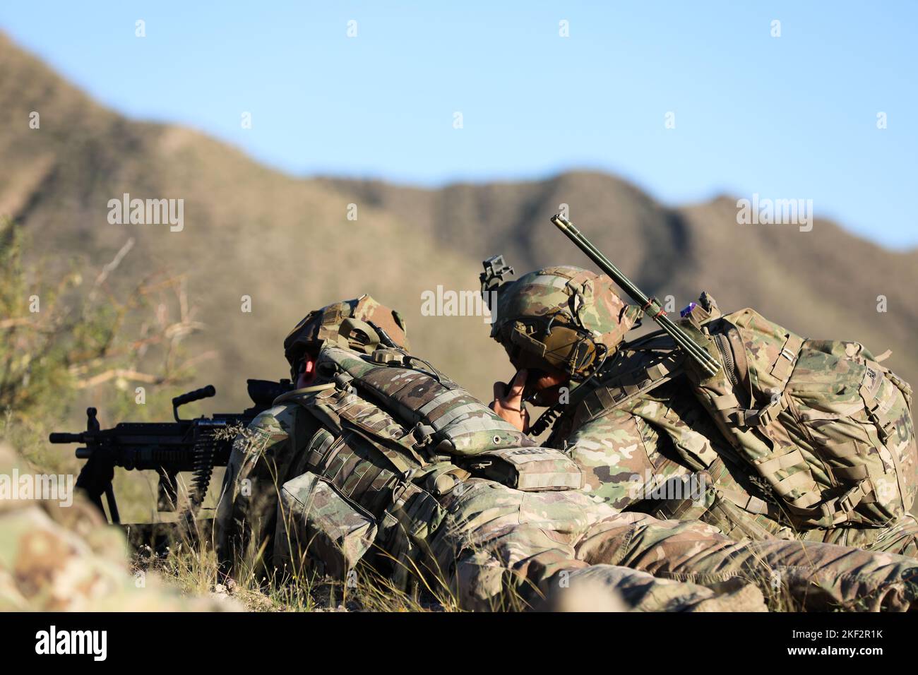 A U.S. Army Soldier, left, and U.S. Army Staff Sgt. Timmy Fair, right ...