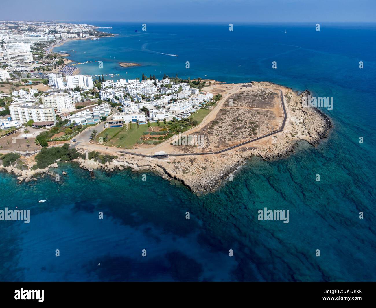 Aerial panoramic view on villas and holidays resorts and blue crystal ...