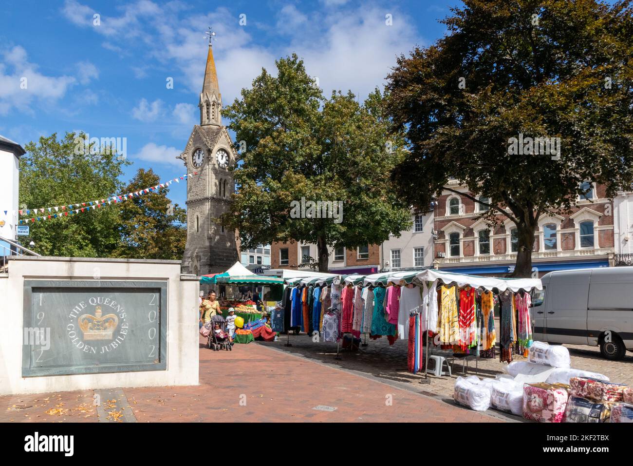 Clock tower and clothing stall, The Market Square, Aylesbury ...