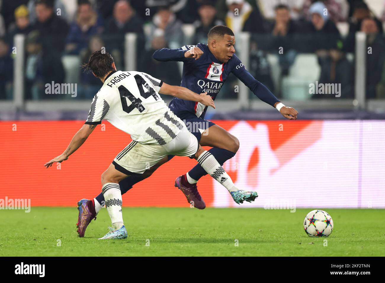 Turin, Italy, 2nd November 2022. Kylian Mbappe of PSG skips over a ...