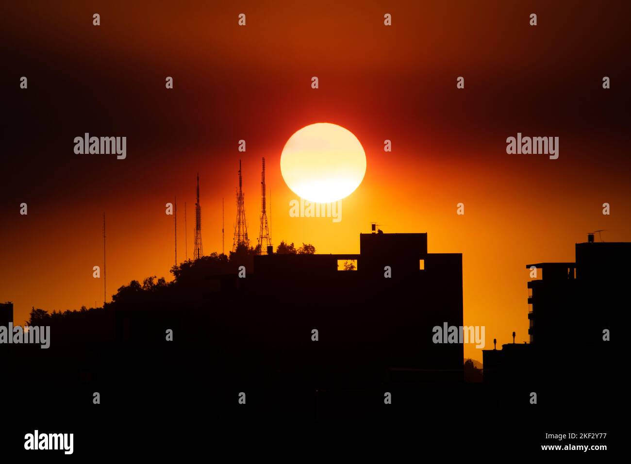 Sun sets behind fire hi-res stock photography and images - Alamy