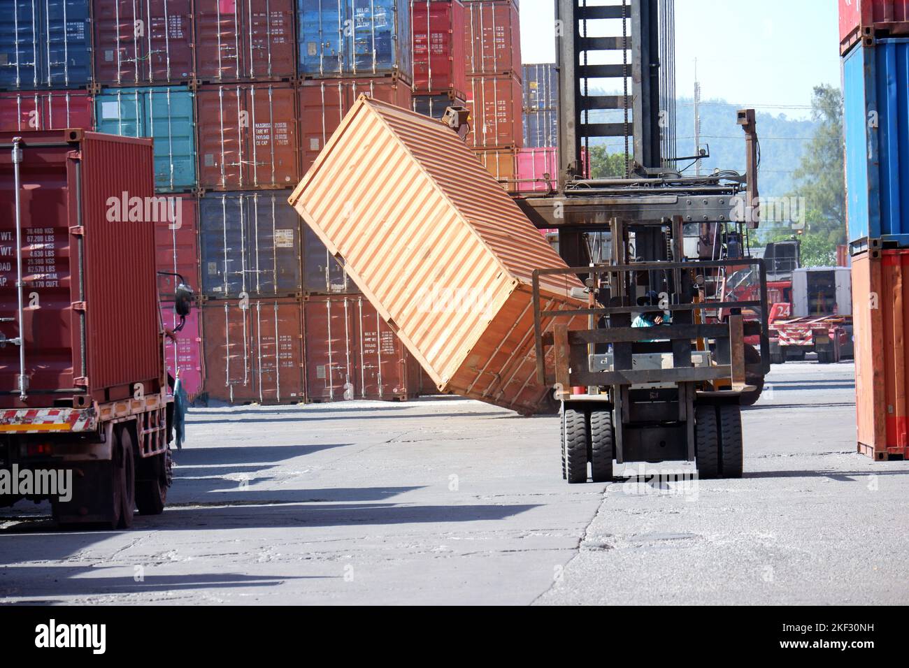 Container forklifts and damaged goods in the yard or wharf are highly ...