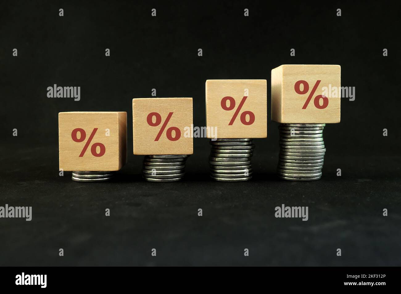 Increase interest rate, tax rise and inflation concept. Wooden blocks ...