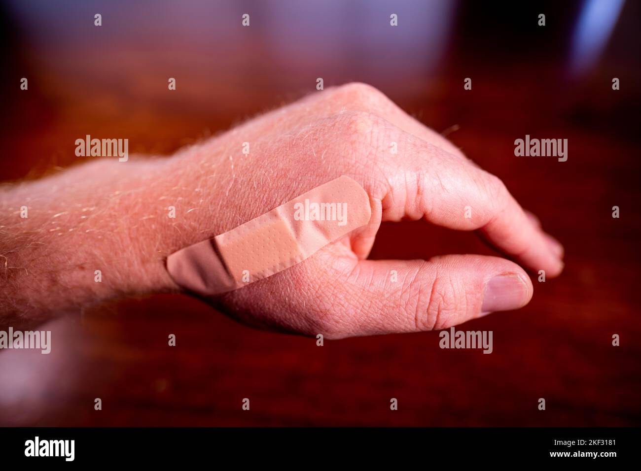 using a band aid on a hand in care Stock Photo - Alamy