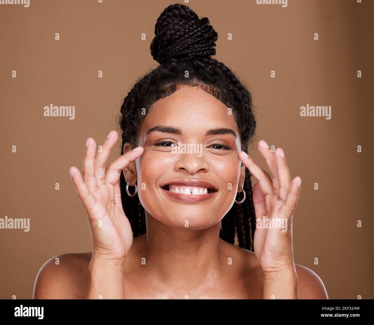 Black woman, face and smile for skincare, makeup or cosmetics against a brown studio background ...