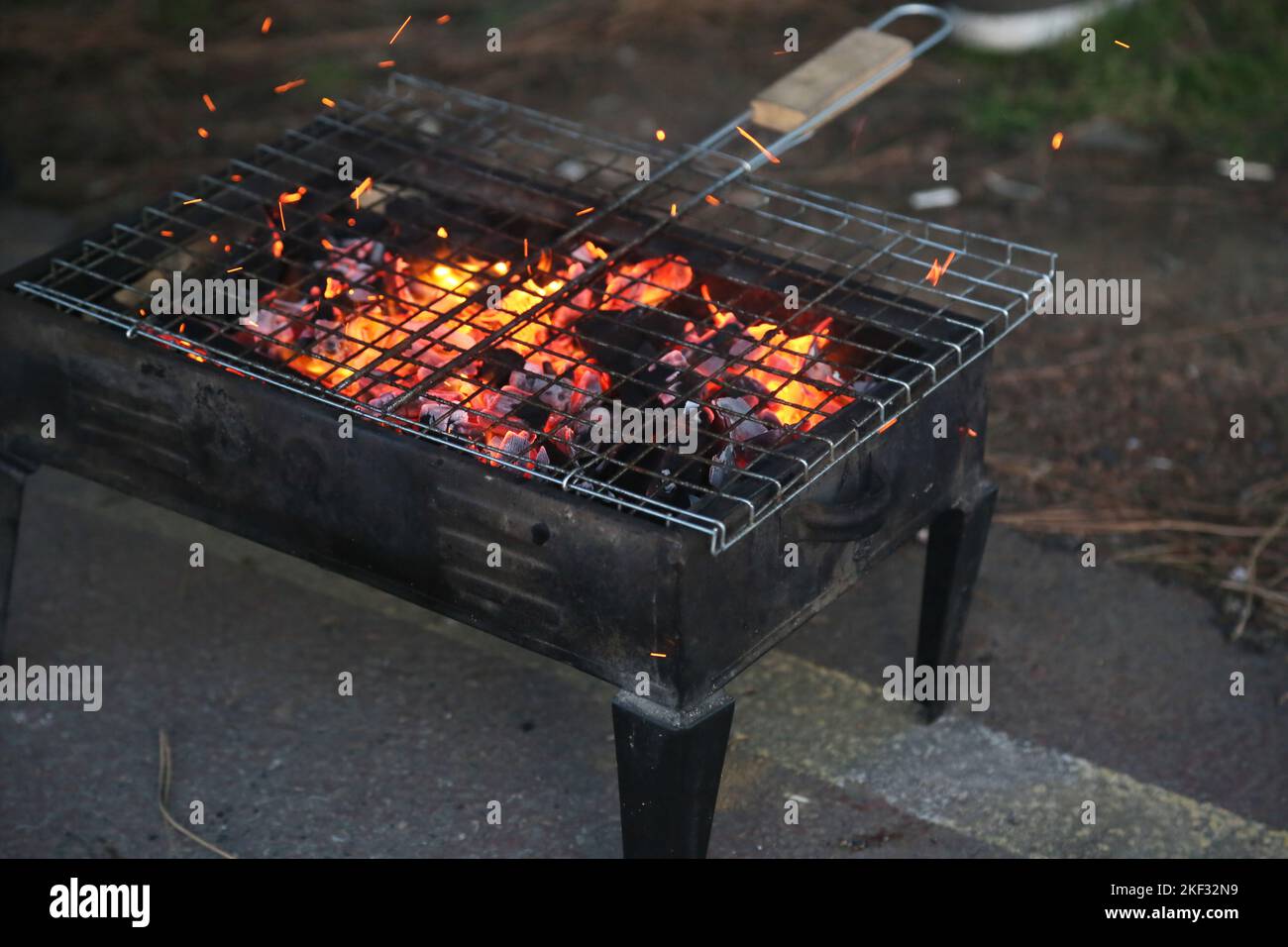Barbecue fire is being prepared before the barbecue meal Stock Photo ...
