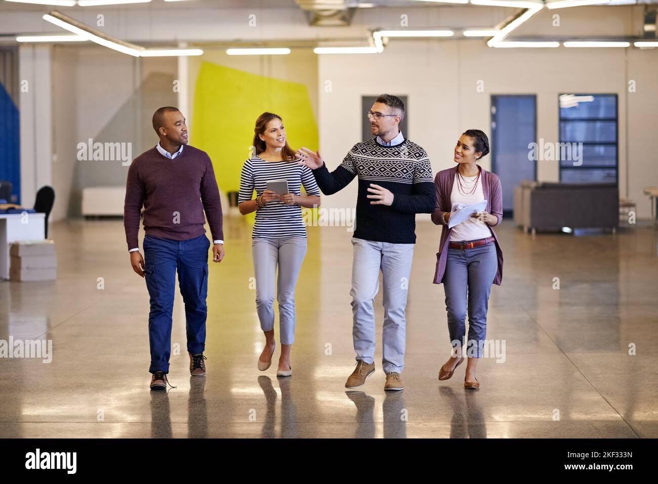 Together we can achieve greatness. a group of work colleagues walking ... Together we can achieve greatness. a group of work colleagues walking ...