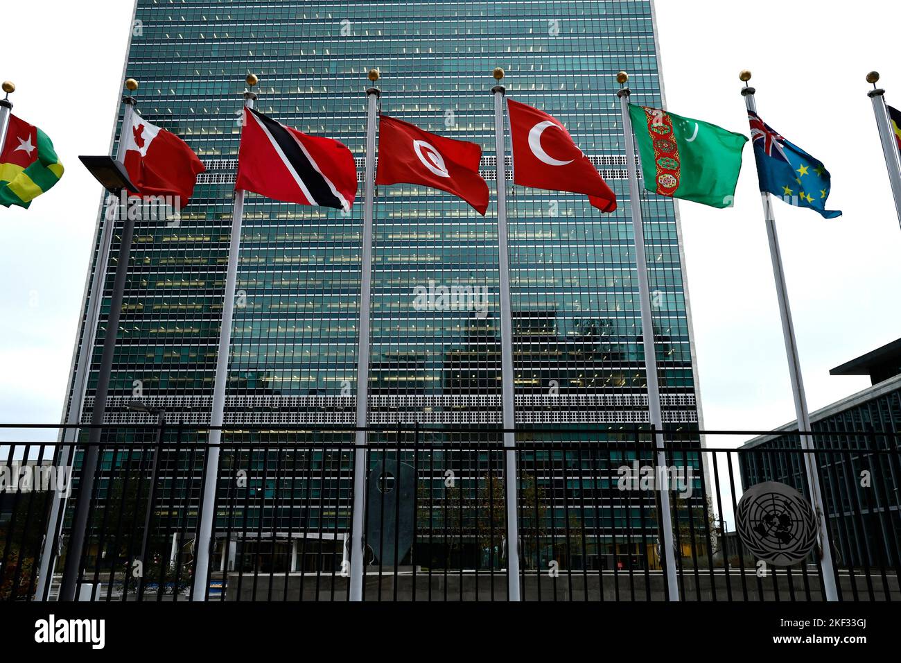 UN member nation flags fly in front of the United Nations headquarters ...