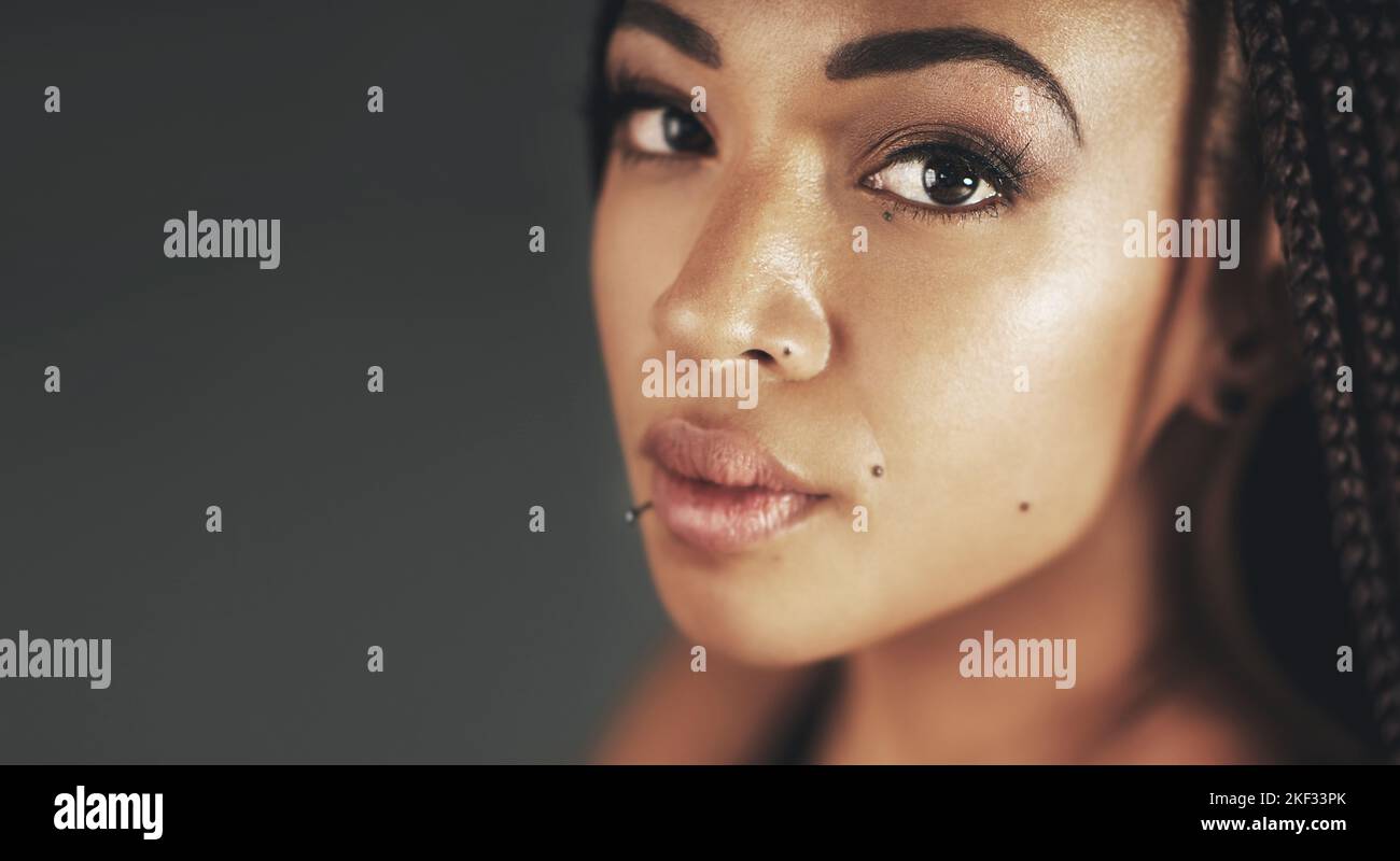 Get up close with real beauty. Studio portrait of a beautiful young ...