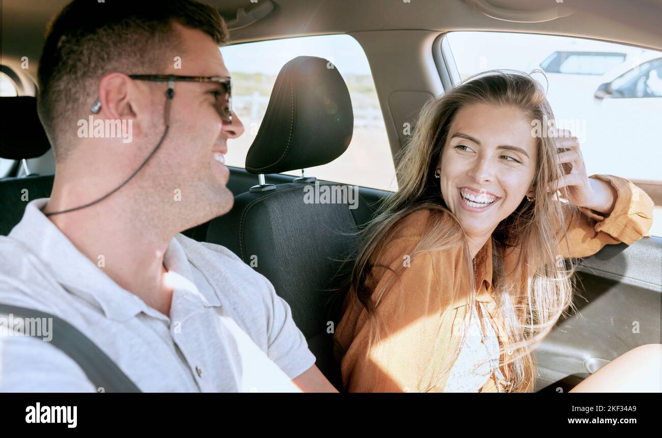 Road trip, couple and smile in car travel together in traffic for ...