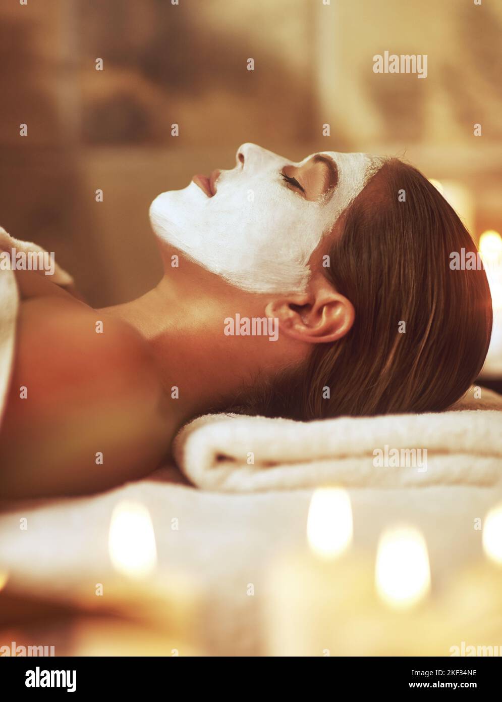 Just let your skin breathe. a young woman enjoying a facial treatment ...