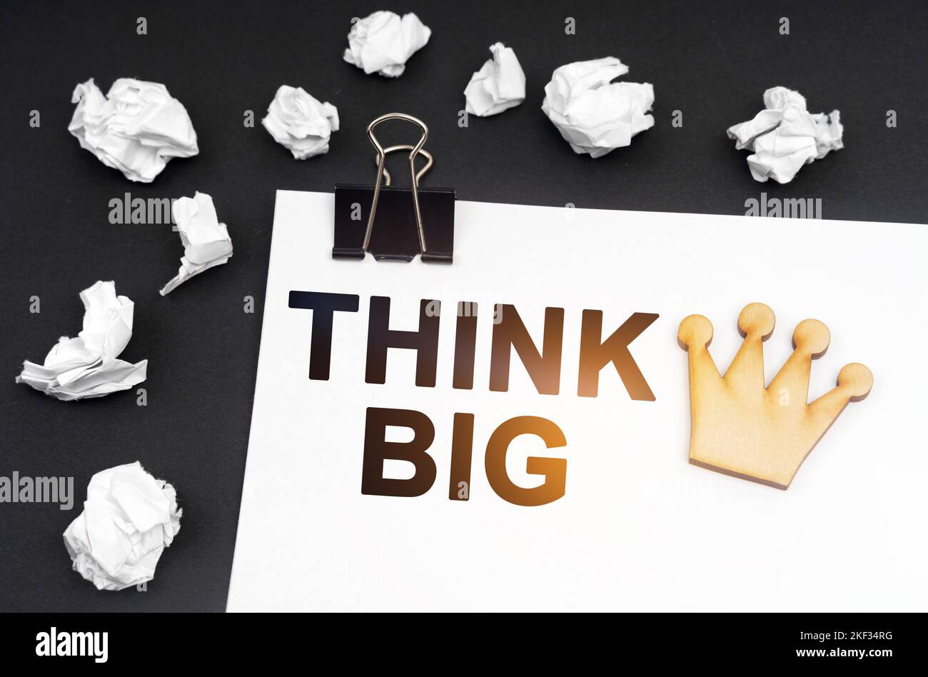 Business and finance concept. On a black background, crumpled paper and ...