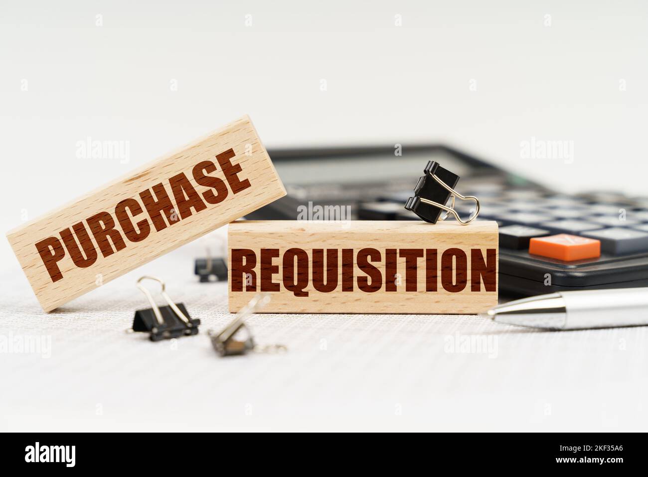 Business and finance concept. On a white background, a calculator, a ...