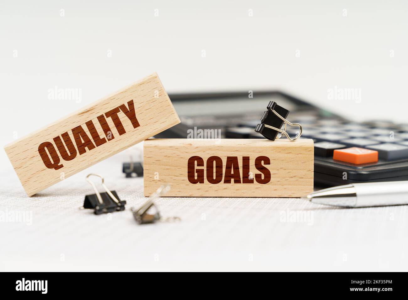 Business and finance concept. On a white background, a calculator, a ...