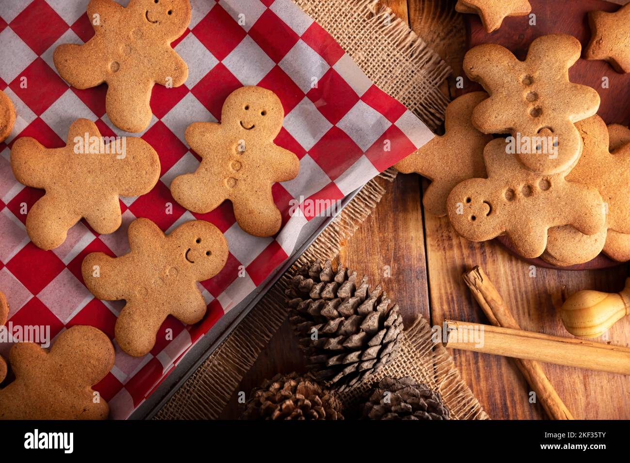 Homemade gingerbread men cookies on rustic wooden table, traditionally ...