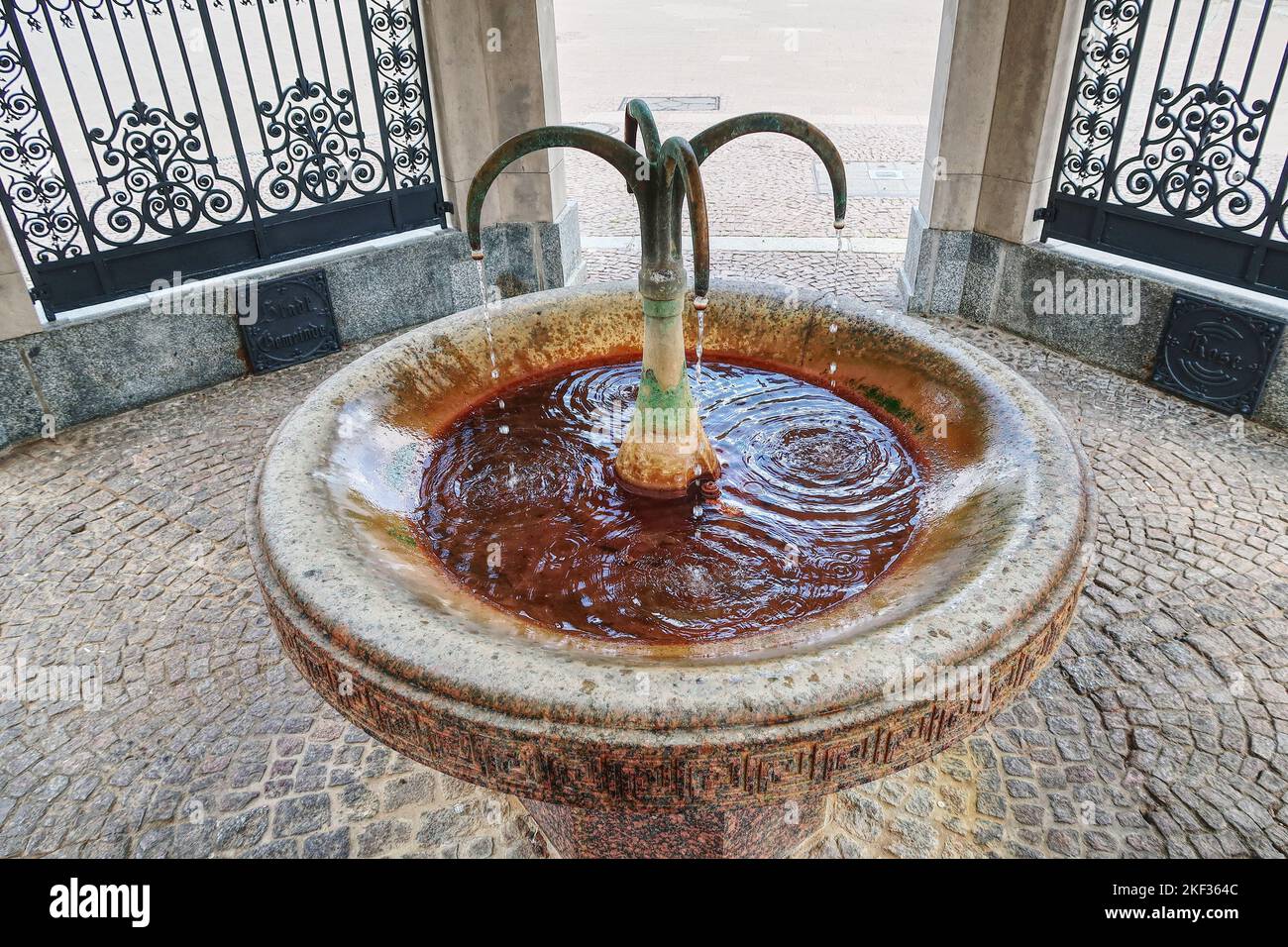 A high angle shot of an old rusty public healing spring in Wiesbaden ...
