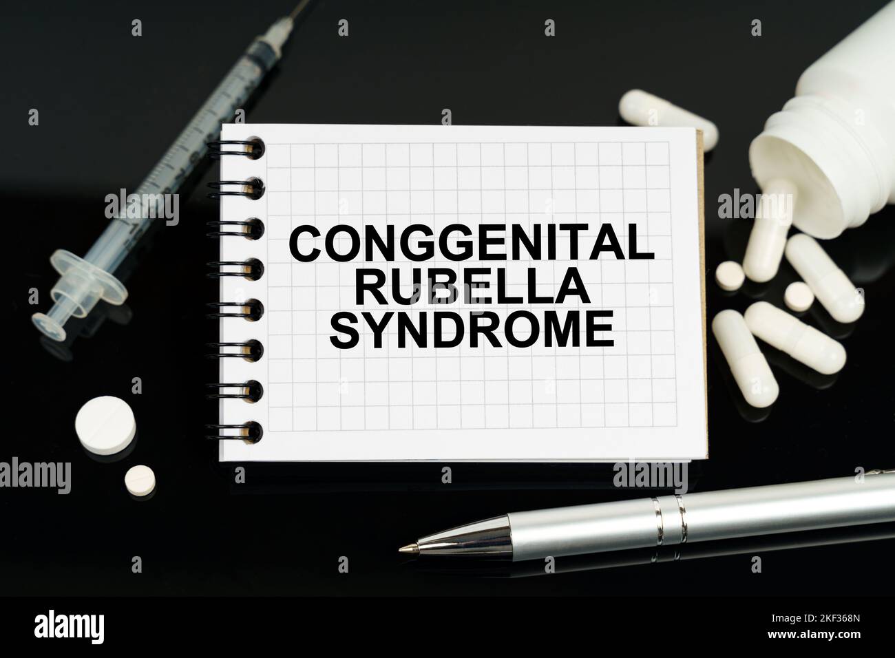 Medicine and healthcare concept. On the black surface are pills, a ...