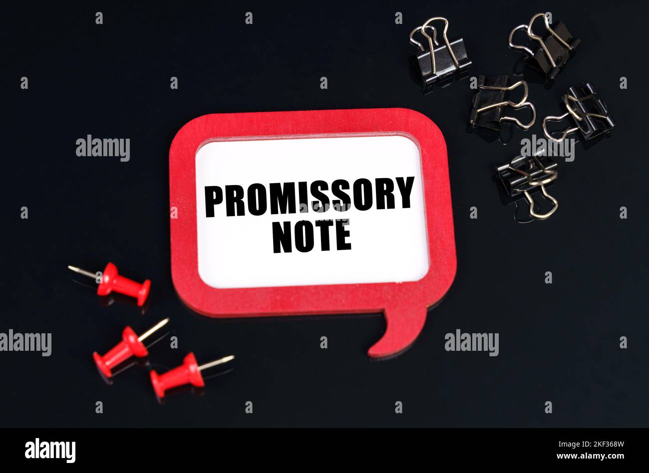 Economy and business concept. On a black surface, office supplies and a ...