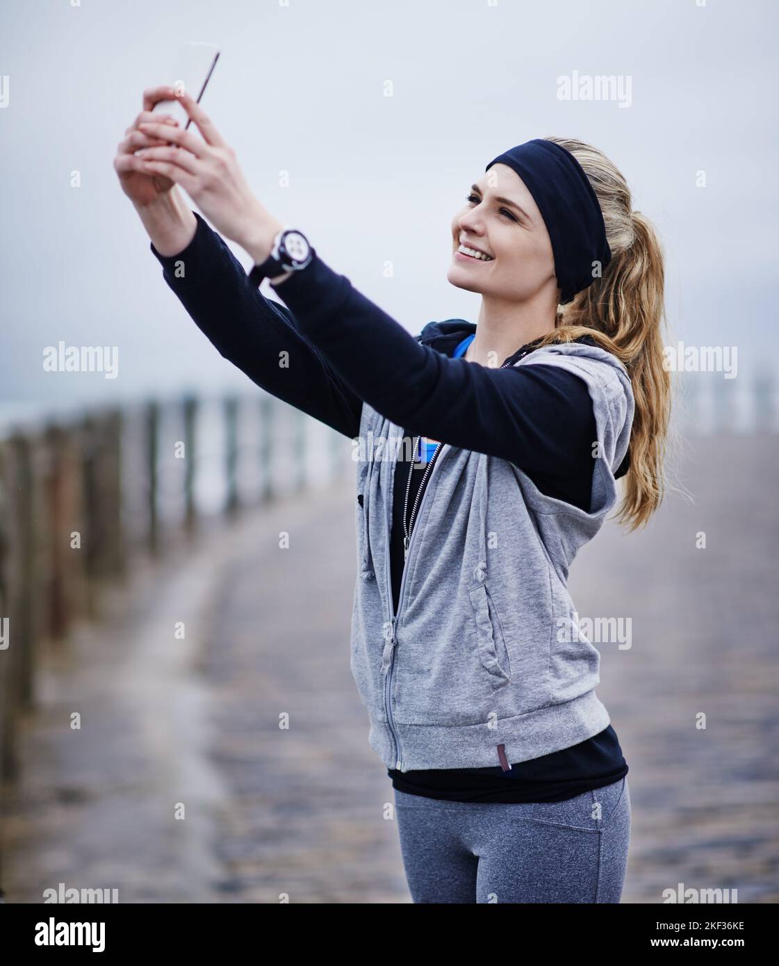 Me On The Road To Fitness A Young Woman Taking A Selfie While