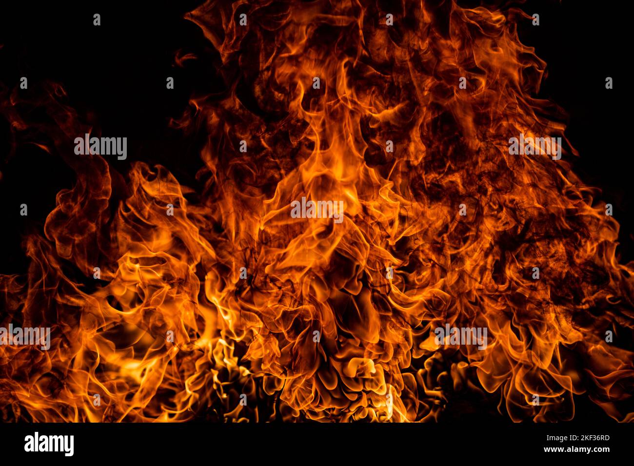 Texture of fire on a black background. Abstract fire flame background ...