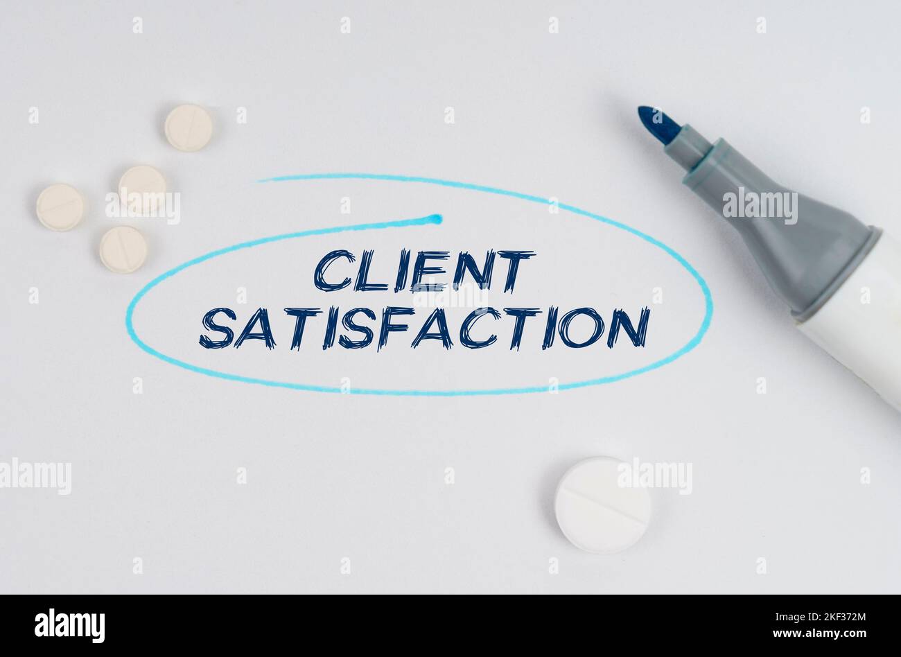 Medicine and healthcare concept. On a white sheet of paper, tablets, a ...