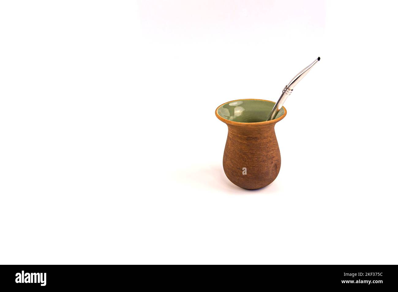Clay mate calabash with bombilla on white background Stock Photo - Alamy