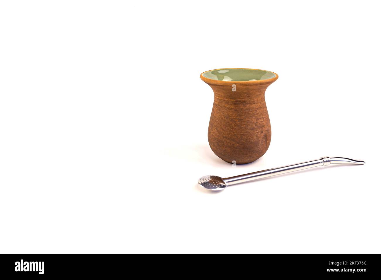 Clay mate calabash with bombilla on white background Stock Photo - Alamy