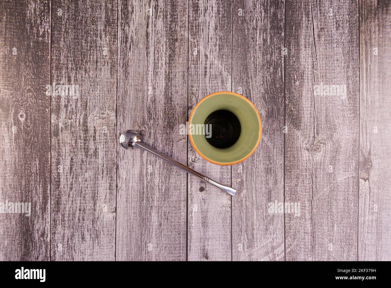 Clay mate calabash with bombilla on grey wood background Stock Photo ...