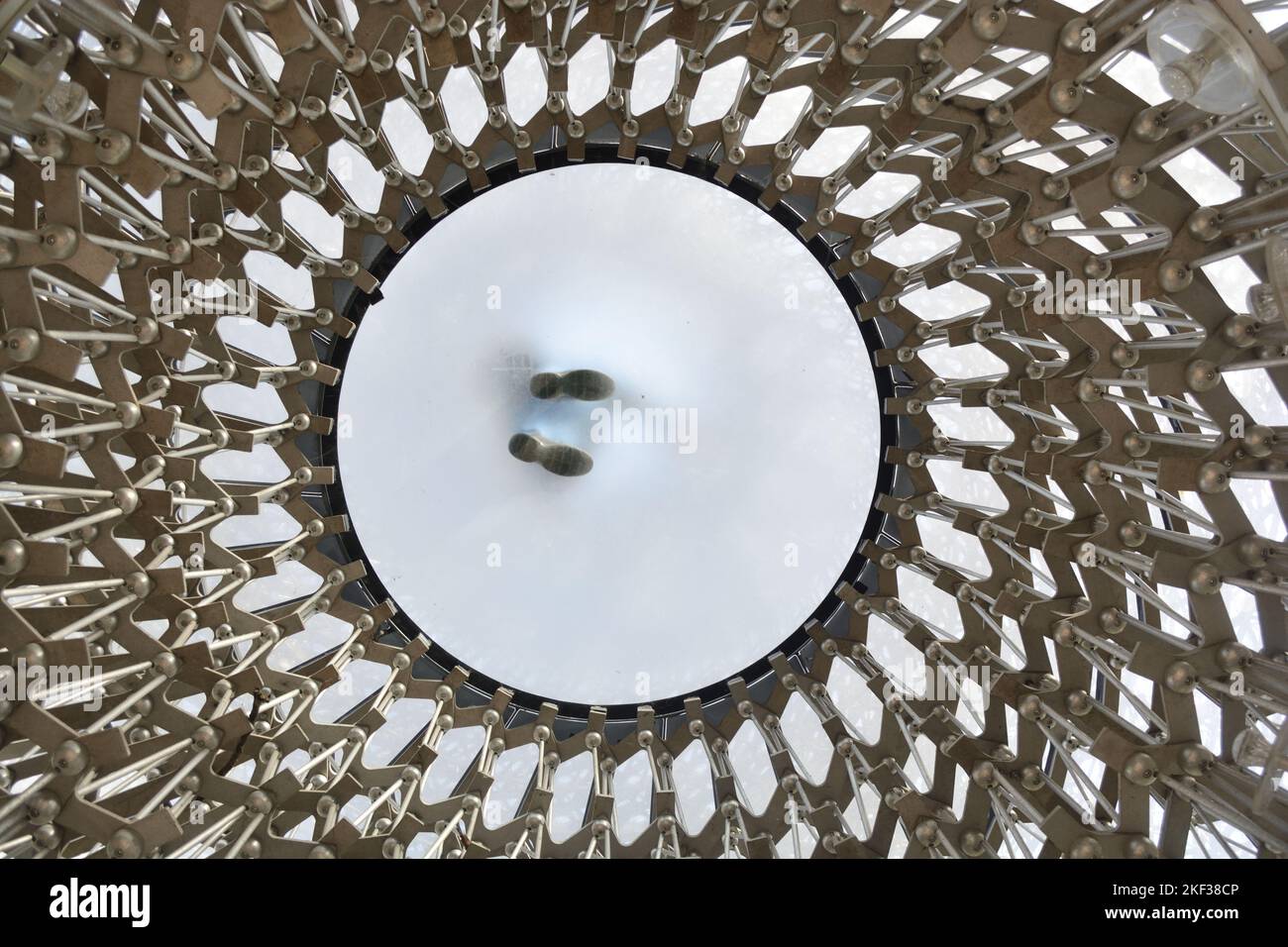 A side view upwards of The Hive at Kew Gardens in London. An intricate ...