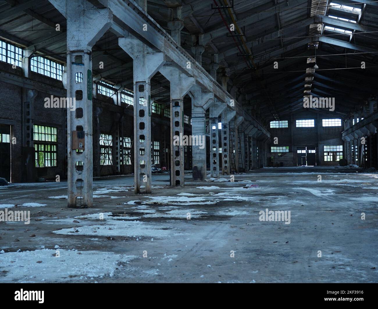An interior of an old abandoned industrial factory Stock Photo - Alamy