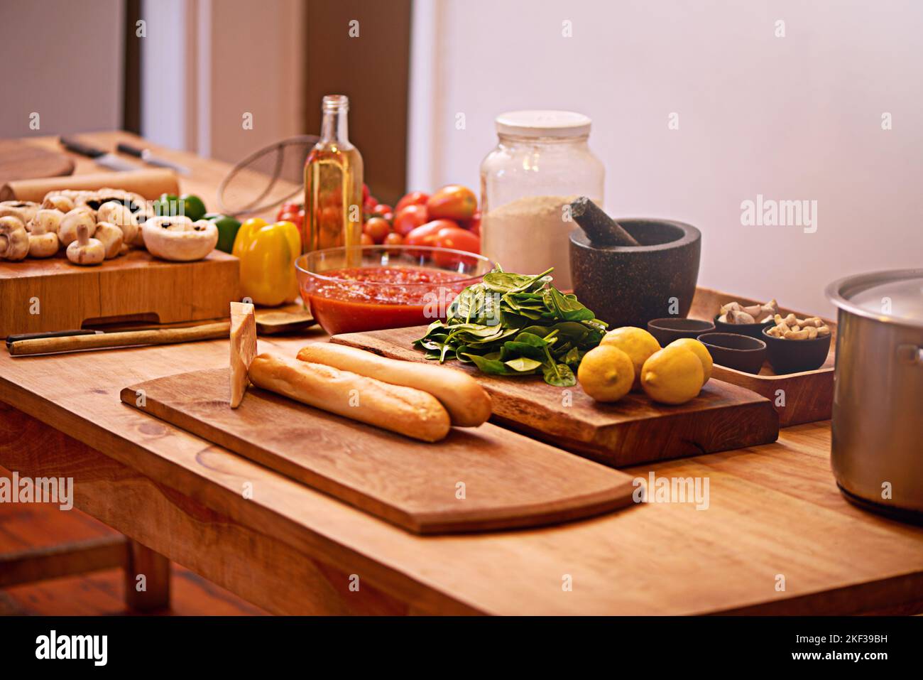 Lets get cooking. a group of ingredients on a tabletop Stock Photo - Alamy