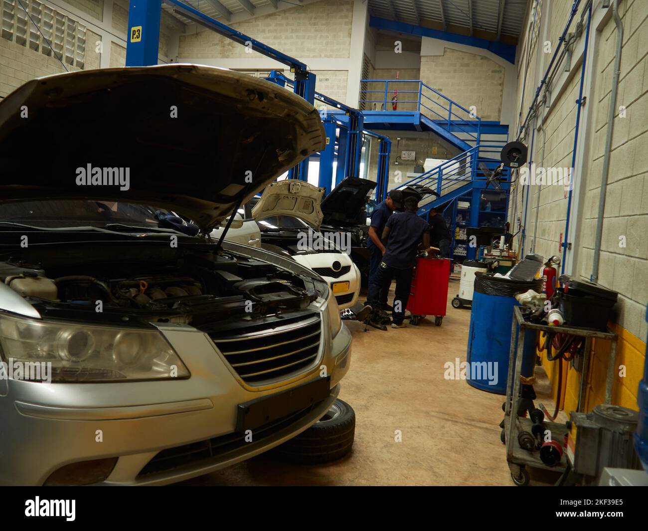 Professional mechanics workshop where automotive mechanics engineers ...